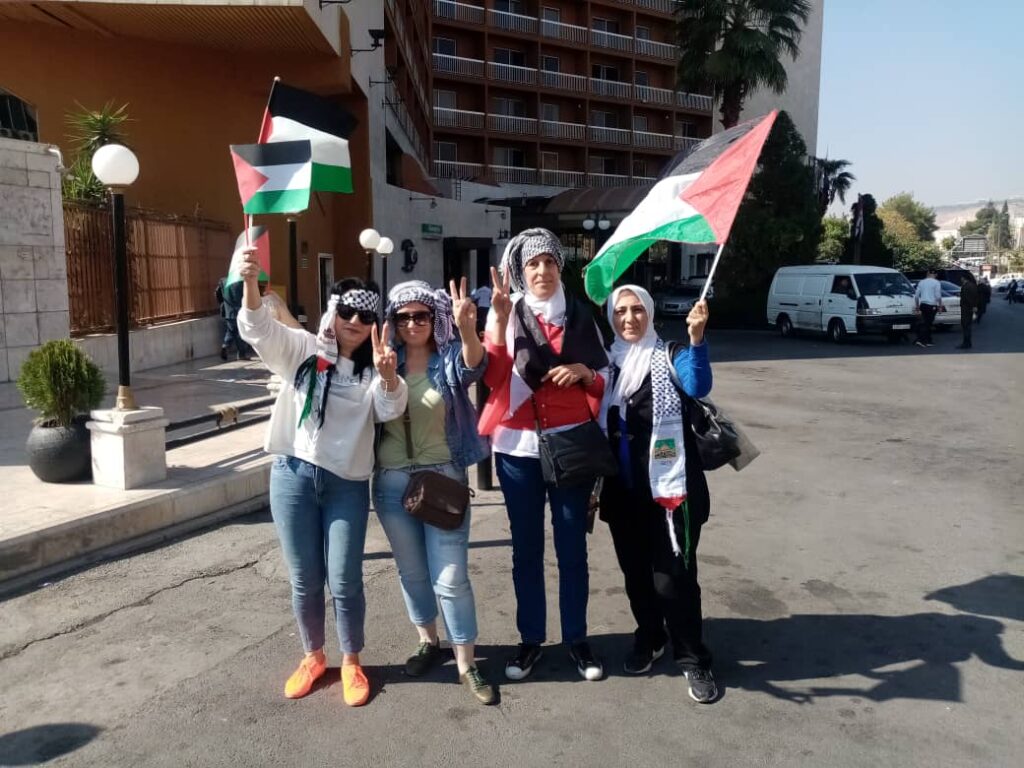 A solidarity stand by the labor unions in Damascus in support of the Palestinian resistance ...